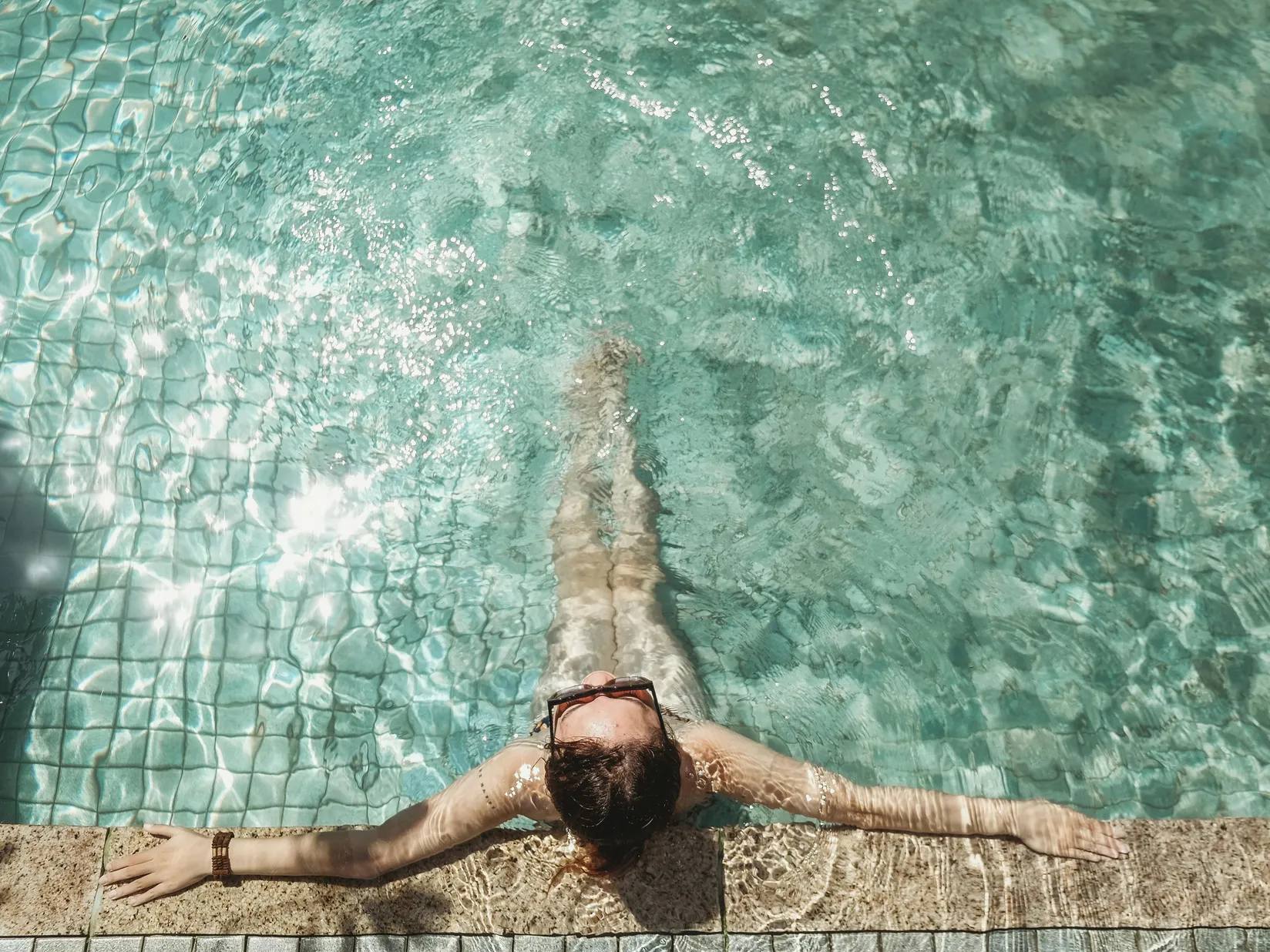 Can You Get in the Pool With a Spray Tan? Can You Tan in the Shade ...